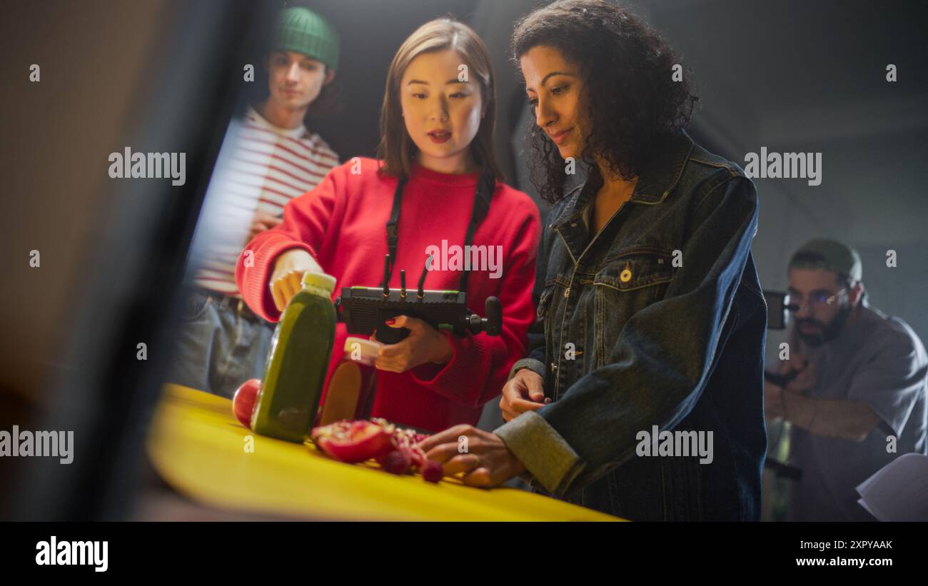 Young Asian Female Director And Black Female Assistant Collaborate On A ...
