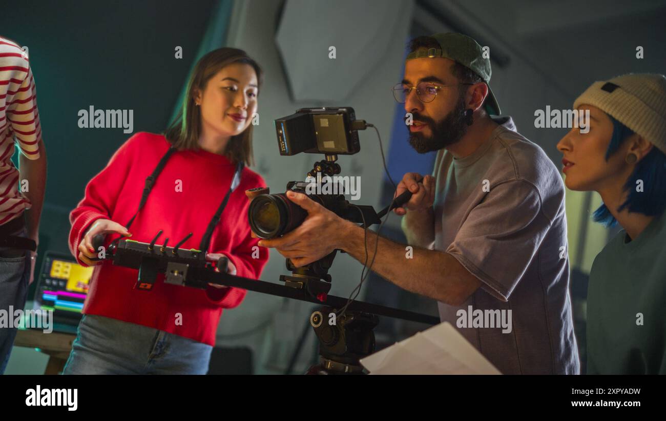 Young Asian Female And Middle Eastern Male Cinematographer Collaborate ...