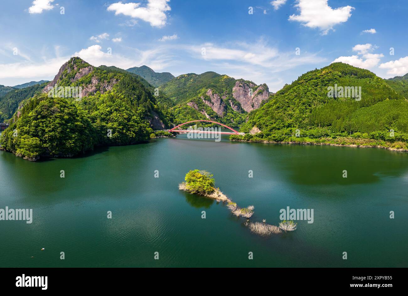 Kyushu, Japan: Dramatic aerial panorama of the Hyugami Dam reservoir ...