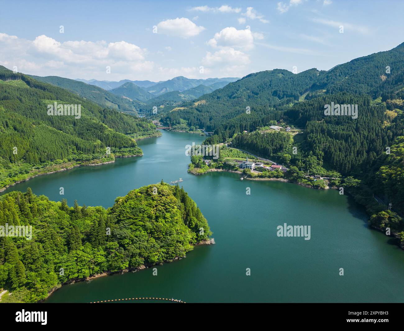 Kyushu, Japan: Aerial view of the Hyugami Dam reservoir in the mountain ...