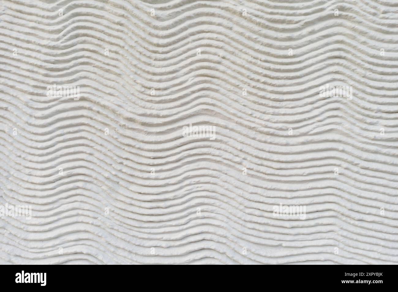 Close-up of horizontal waves in the mortar of a house wall, horizontal ...
