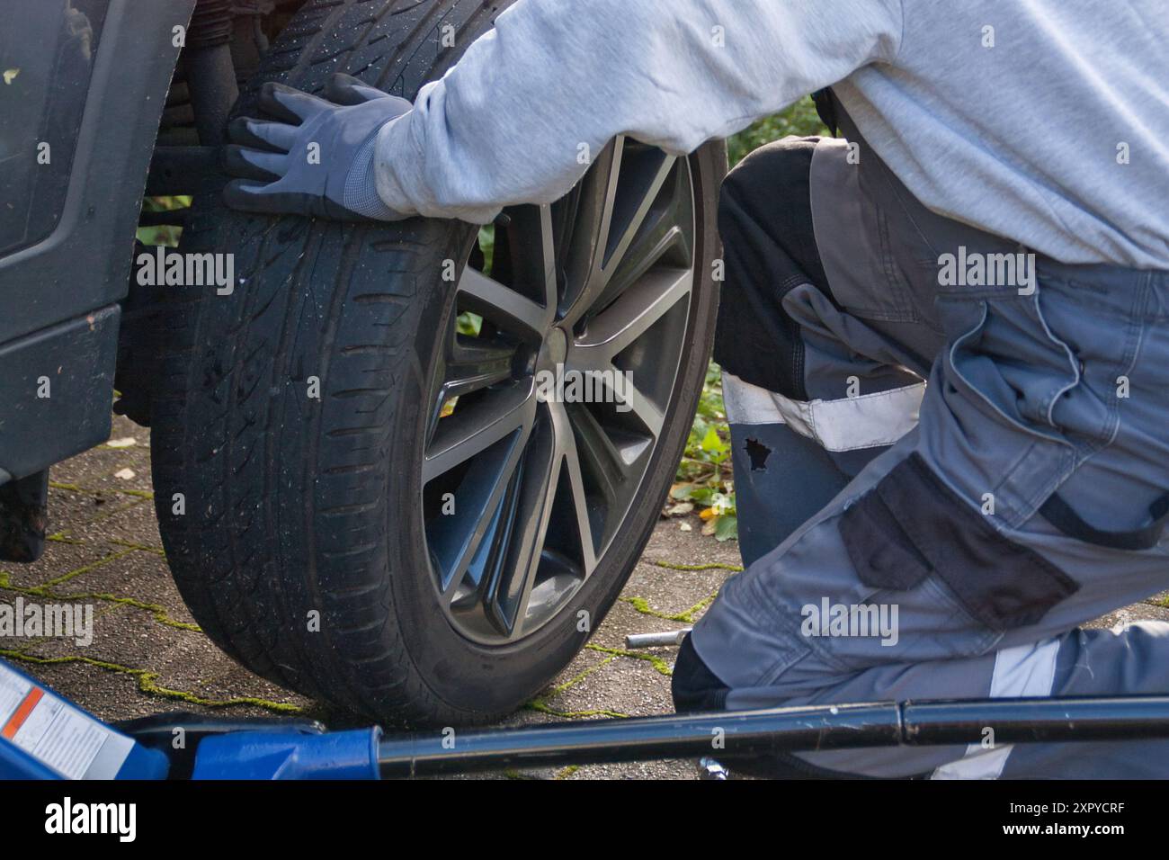 a wheel is removed from a vehicle Stock Photo - Alamy