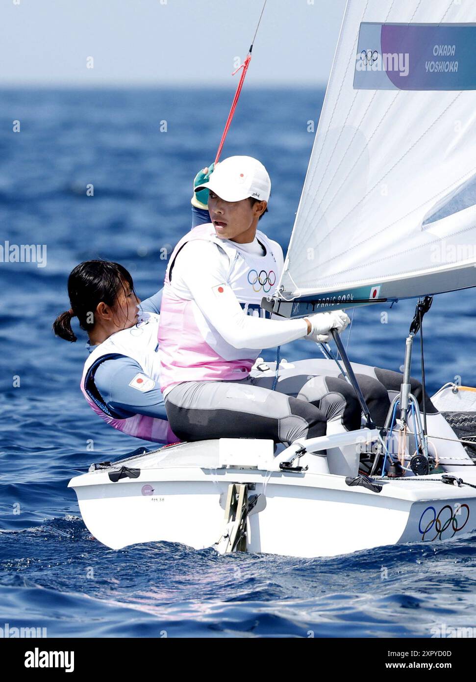 Japan's Keiju Okada (front) and Miho Yoshioka compete en route to ...