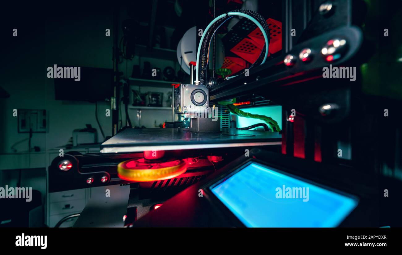 3D printer home factory interior. Dark room. Object building nozzle ...