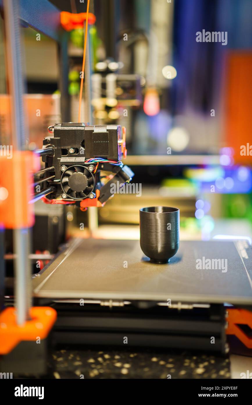 3D object printed by 3d printer farm in a home factory. Production and ...