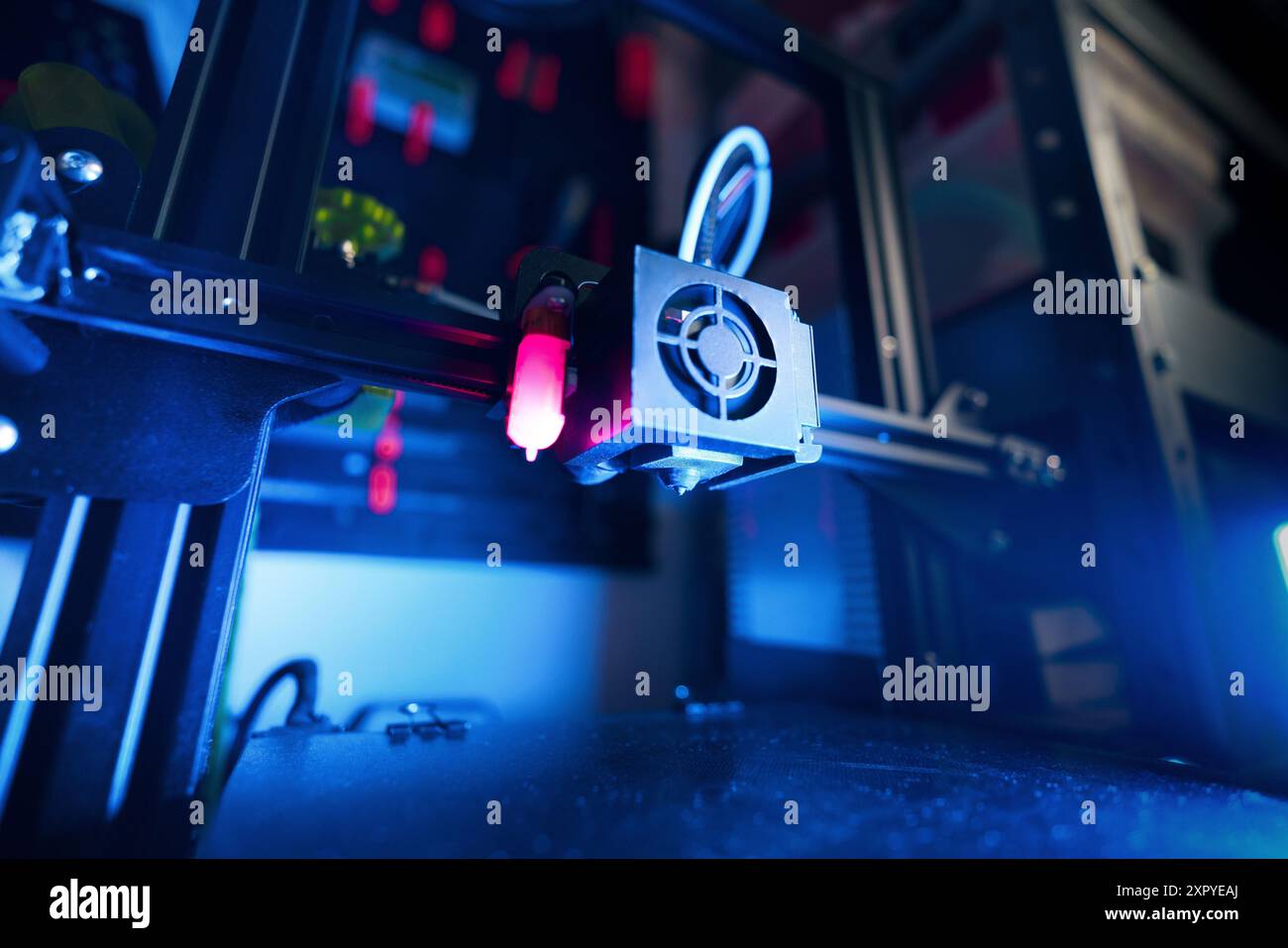 3d printer, dark laboratory. Neon light background. Creative workshop ...