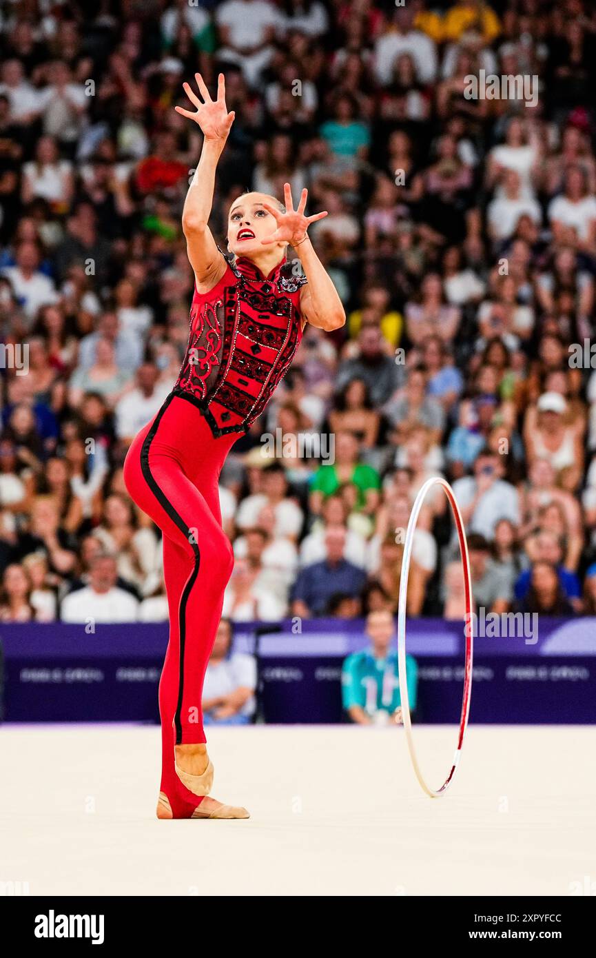 Taisiia Onofriichuk of Ukraine performs with the hoop during Individual ...