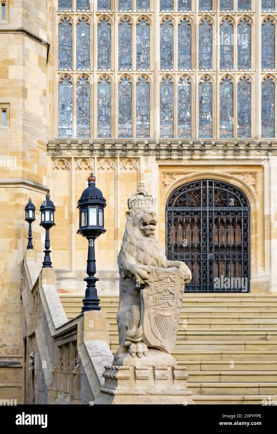 Stone lion bearing a shield with the royal arms, on the steps of the ...