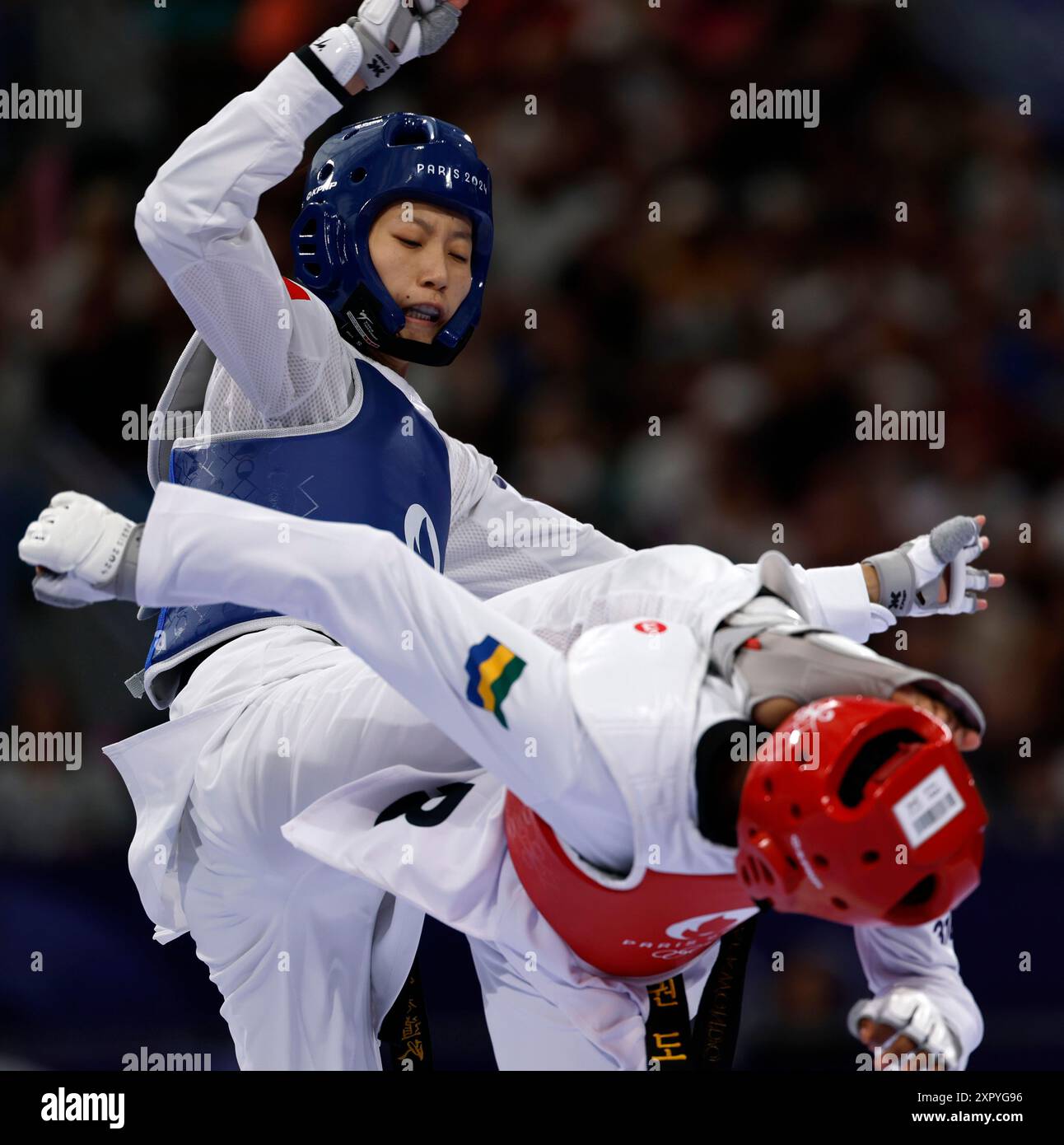 Paris, France. 8th Aug, 2024. Luo Zongshi (L) of China competes against ...