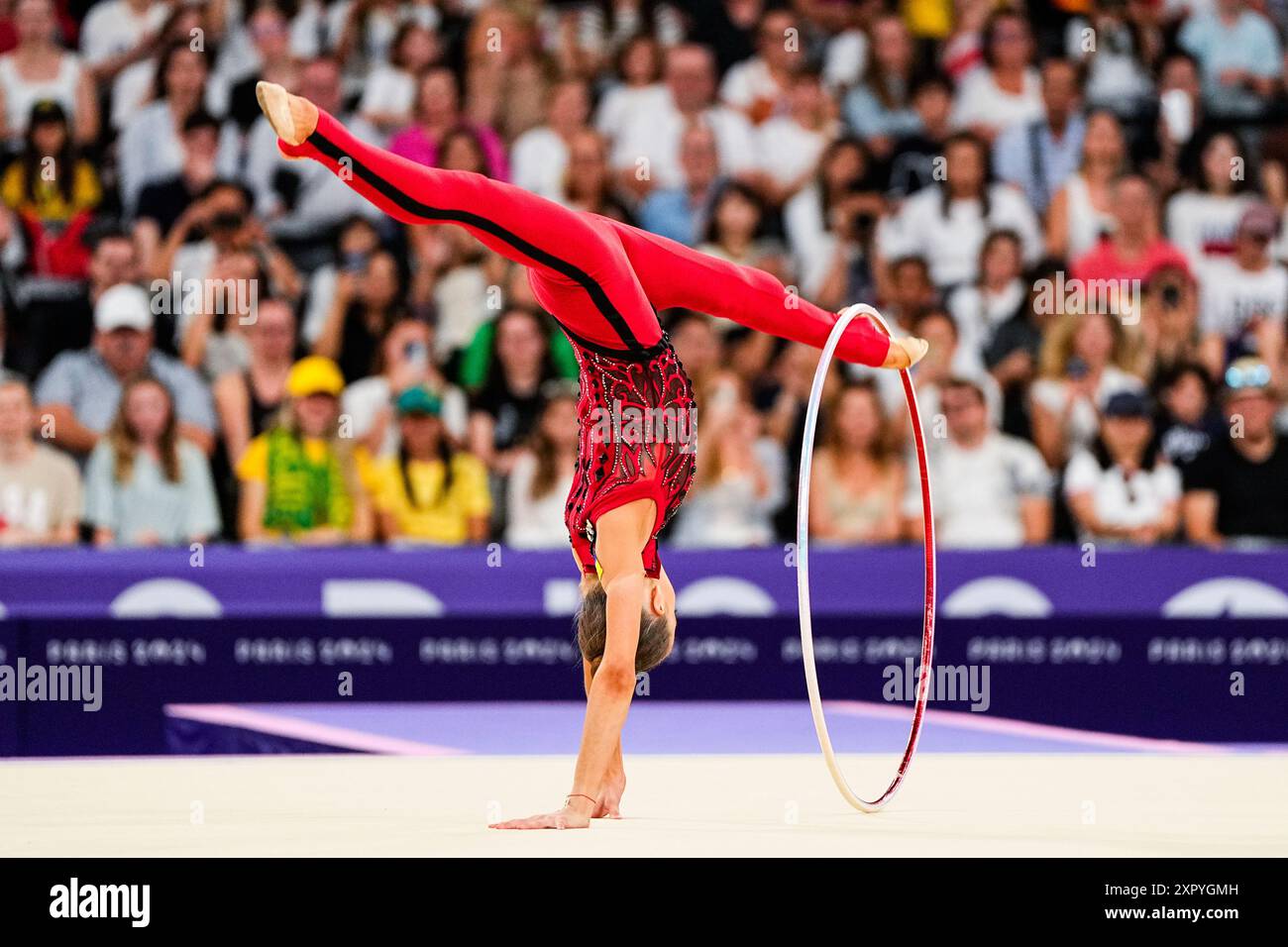Taisiia Onofriichuk of Ukraine performs with the hoop during Individual ...
