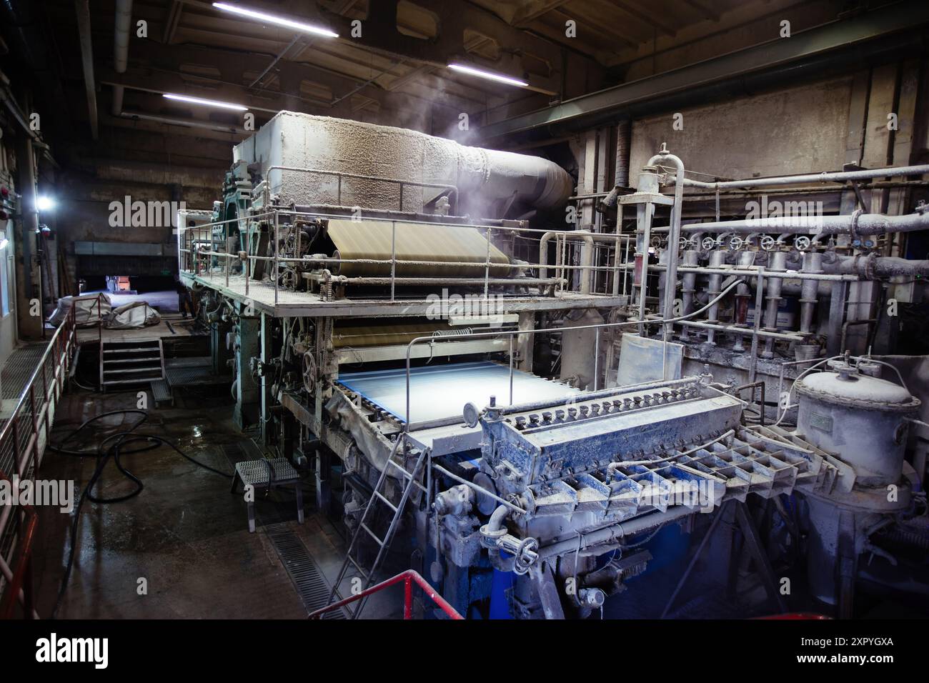 Waste paper recycling plant. Machine for production of paper rolls ...