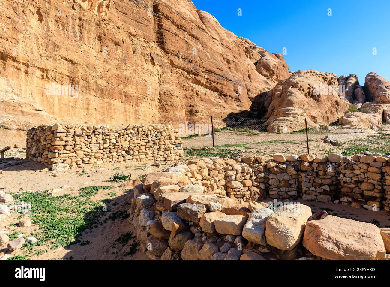 Ruins of the ancient Nabatean city of Petra, in the Wadi Musa desert in ...