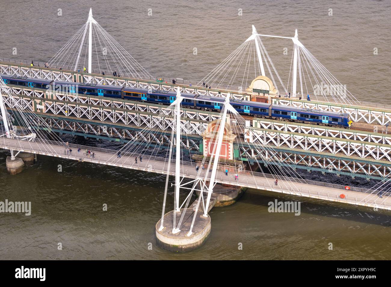 The Hungerford Bridge and Golden Jubilee Bridges across the River ...