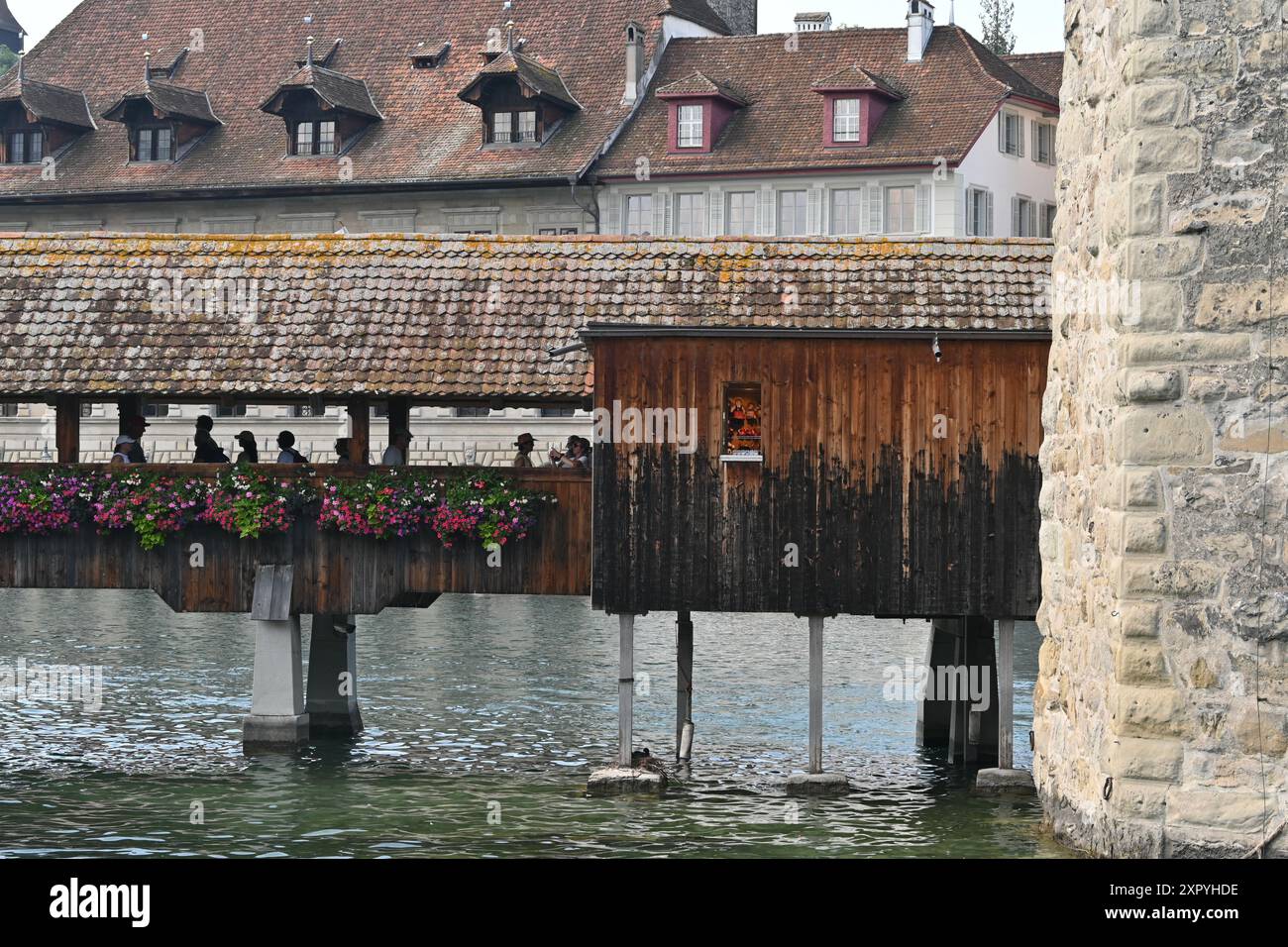 View of Kapellbrücke (Chapel bridge), a covered wooden footbridge ...
