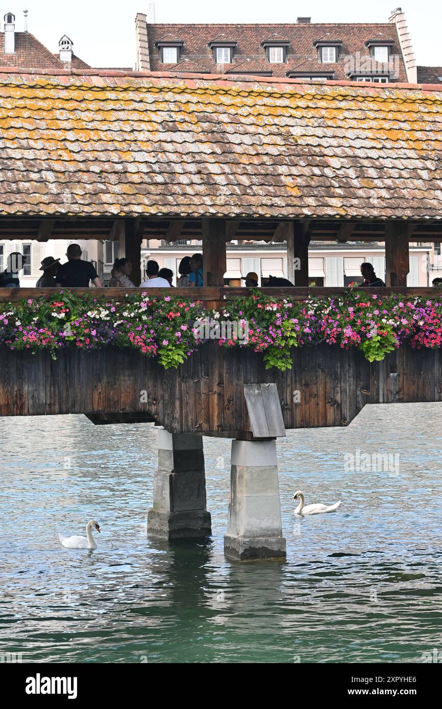 View of Kapellbrücke (Chapel bridge), a covered wooden footbridge ...