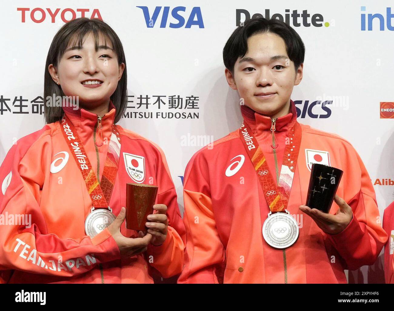 Japanese figure skaters Kaori Sakamoto (L) and Yuma Kagiyama pose for a ...