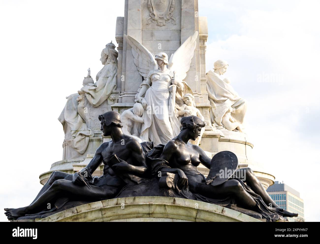 Marble statues of (left to right) Queen Victoria, an angel of Justice ...