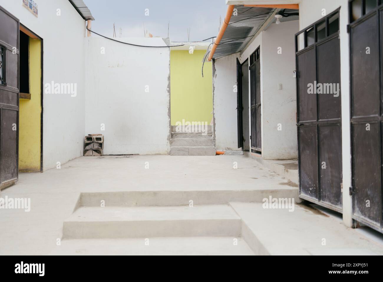 Alley between school buildings Stock Photo - Alamy