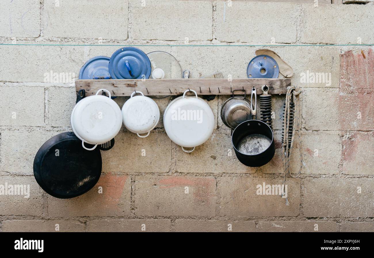 Kitchen utensils hanging cookware hi-res stock photography and images ...