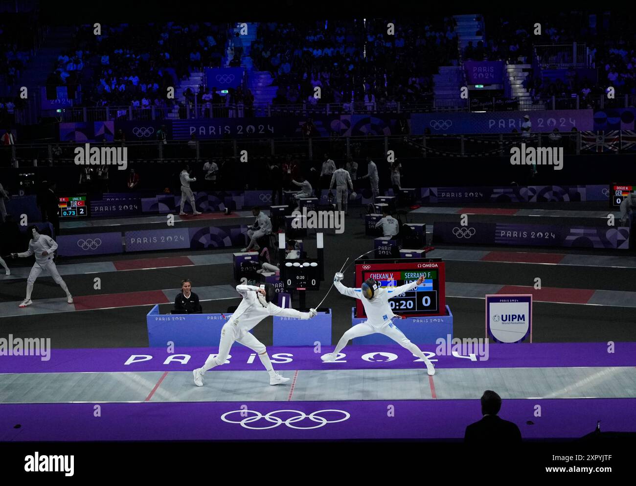 Ukraine's Vladyslav Chekan and Argentina's Franco Serrano compete in ...