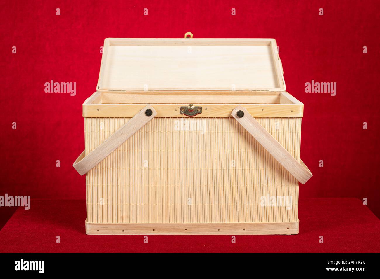 a bamboo container on red backgrond Stock Photo - Alamy