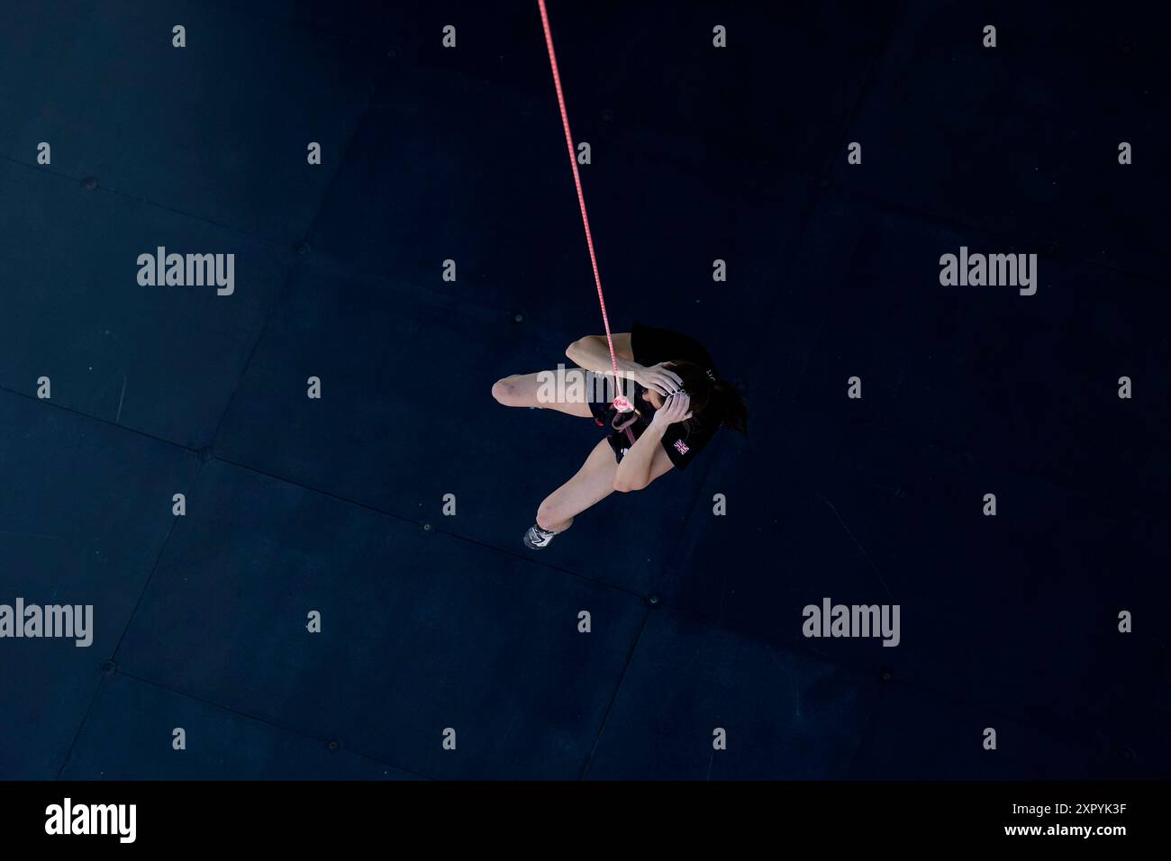Erin McNeice of Britain reacts as she competes in the women's boulder ...