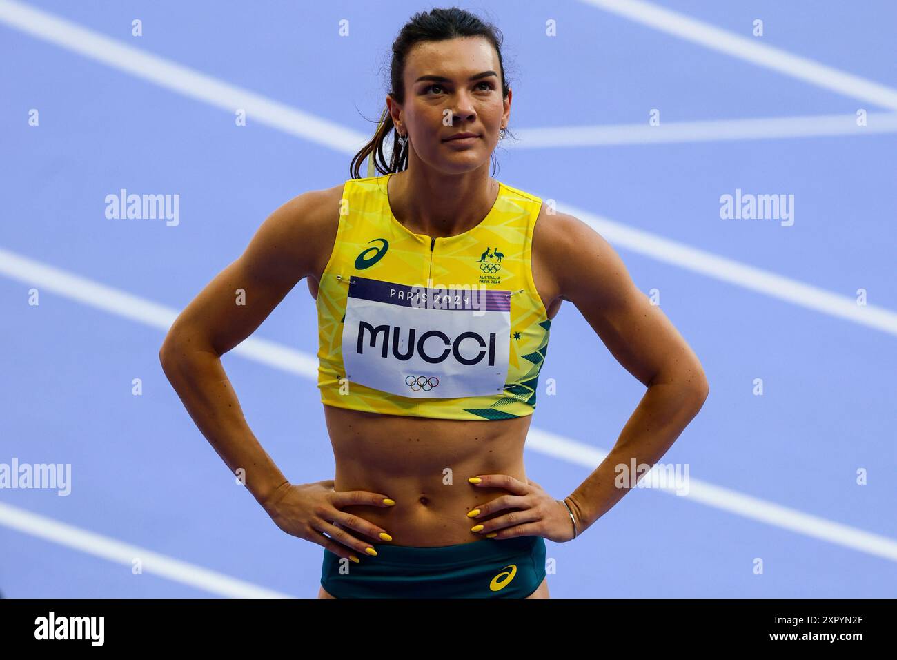Celeste Mucci of Australia competes during Women's 100m Hurdles ...