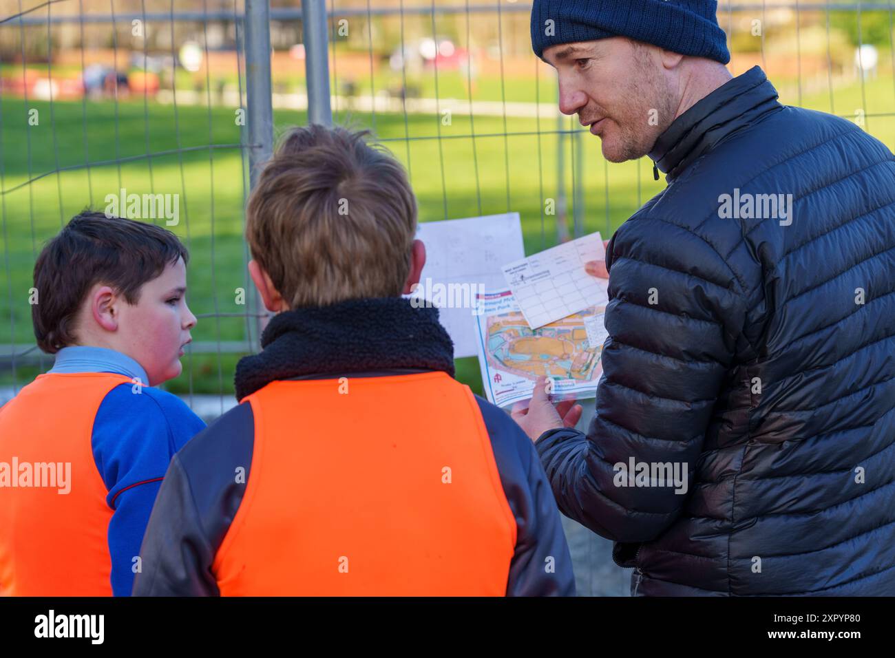 Primary school children on an orienteering lesson in the park Stock ...
