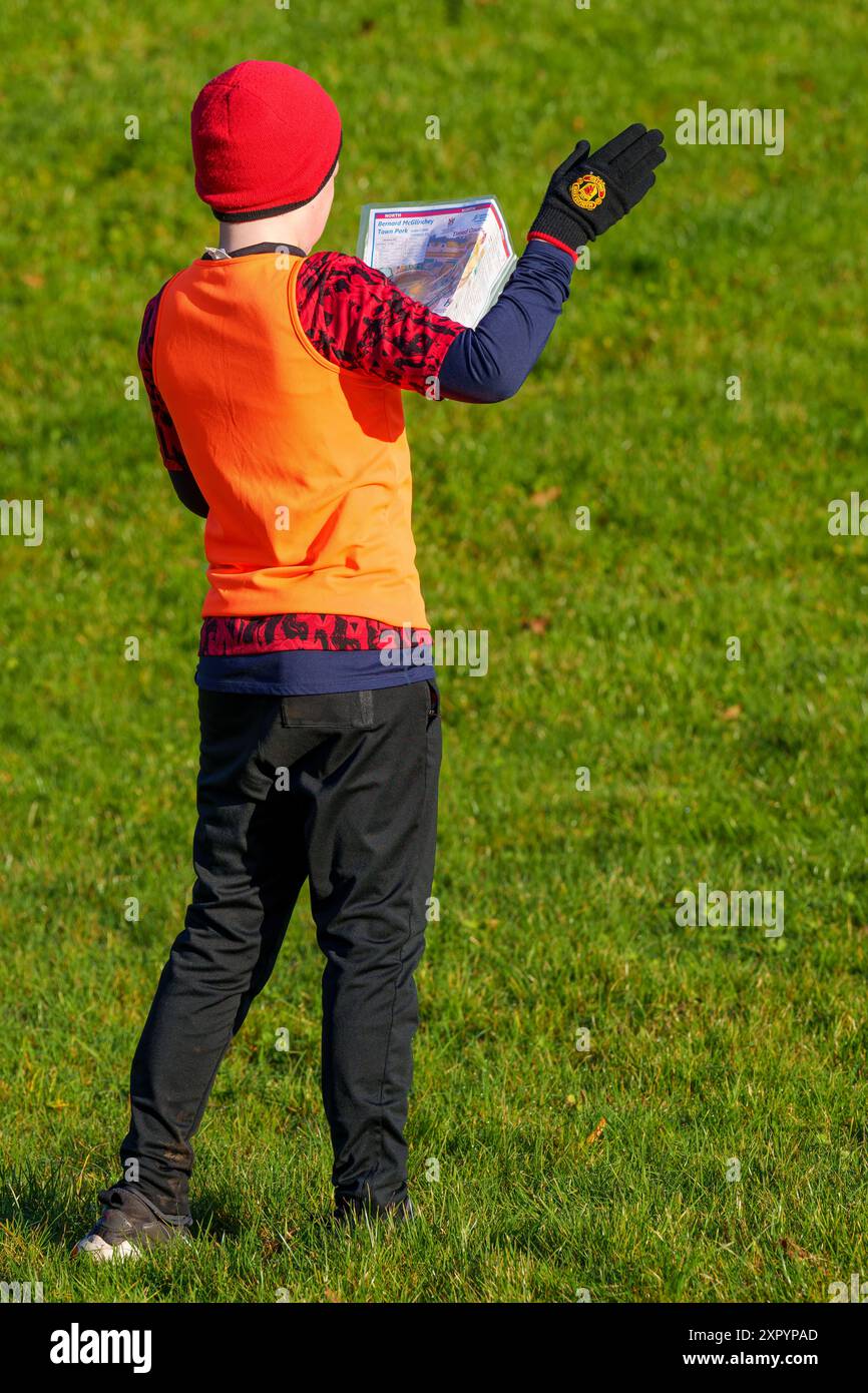 Primary school children on an orienteering lesson in the park Stock ...