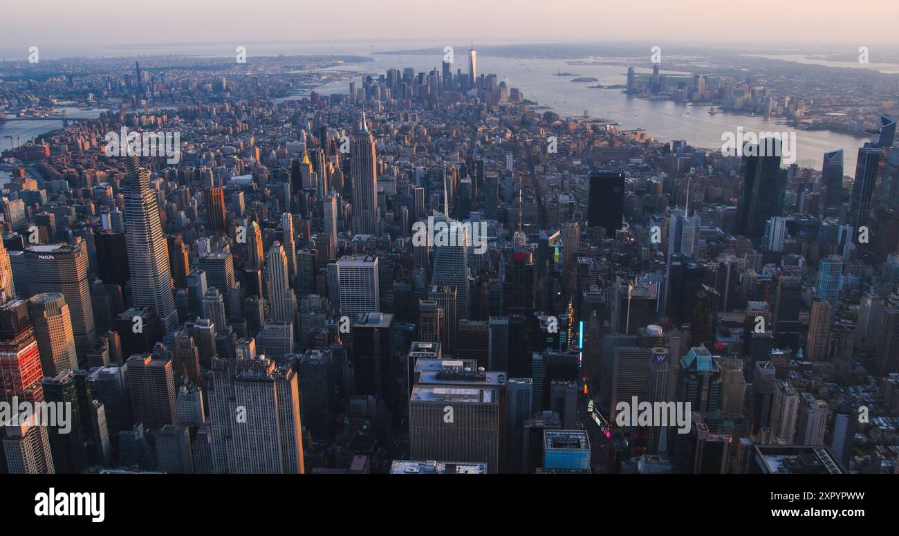 Sunny Aerial Evening Image of Manhattan with Endless Busy Roads ...