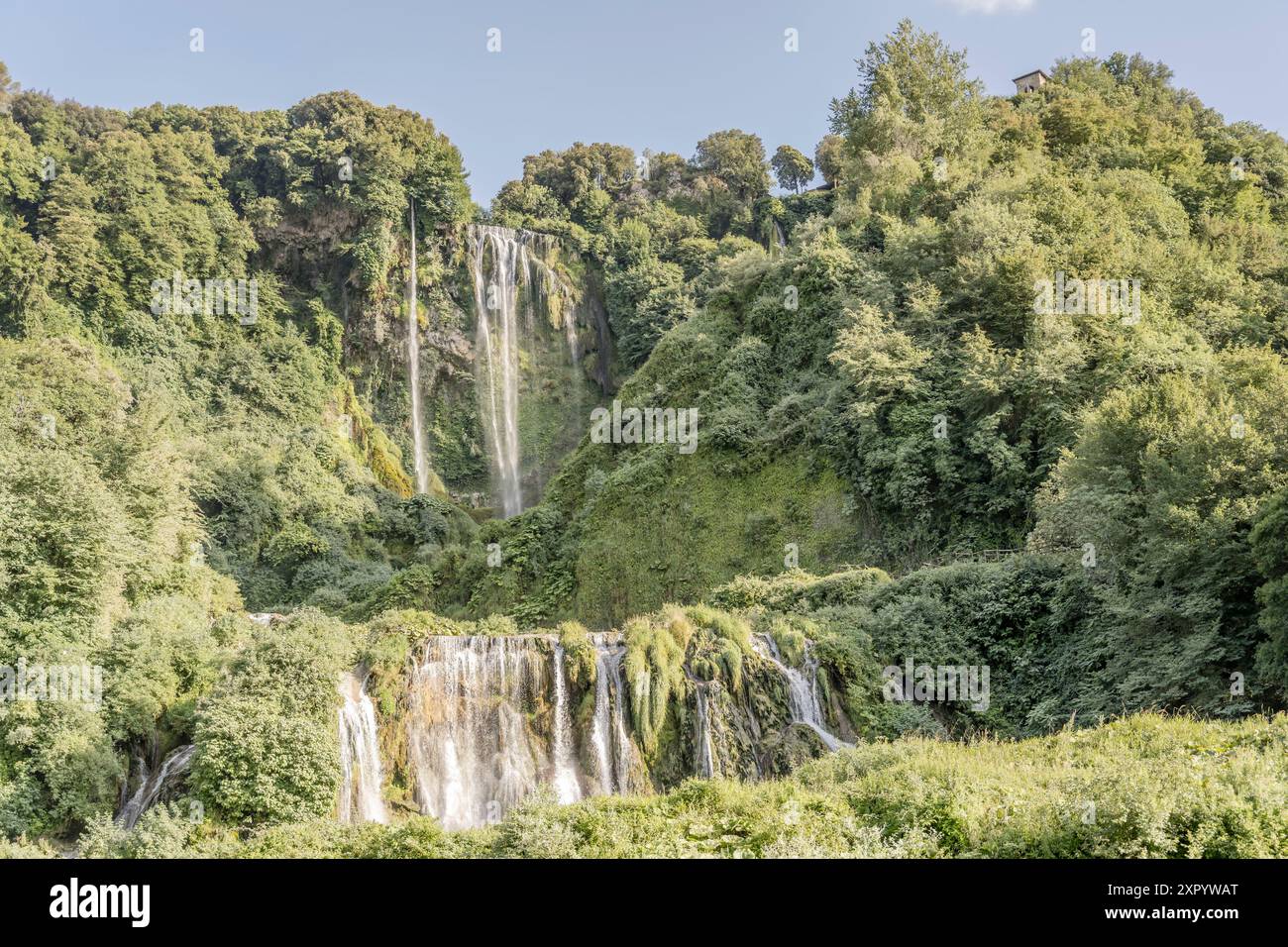 landscape with fading water flow at tall waterfall closing time, shot ...