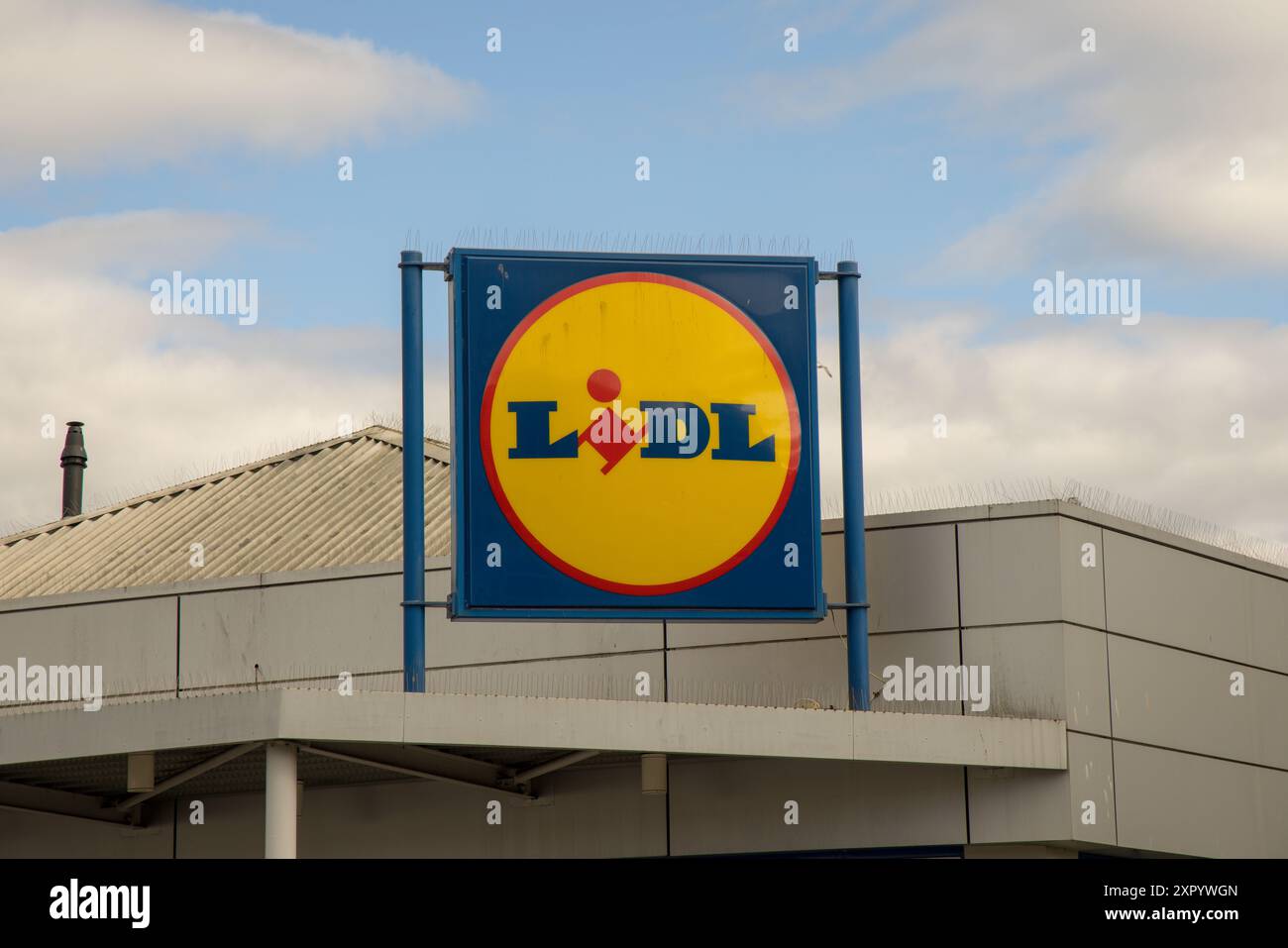 Sign with LIDL logo on the roof of a Lidl supermarket in Dundee ...