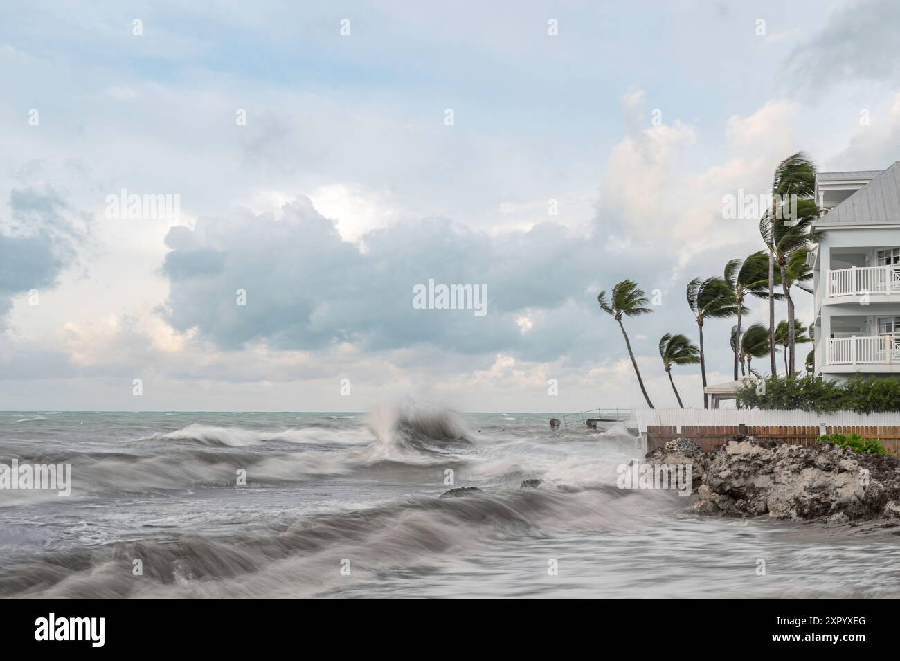 An angry ocean, lashing the shore of Key West, Florida, as it is ...