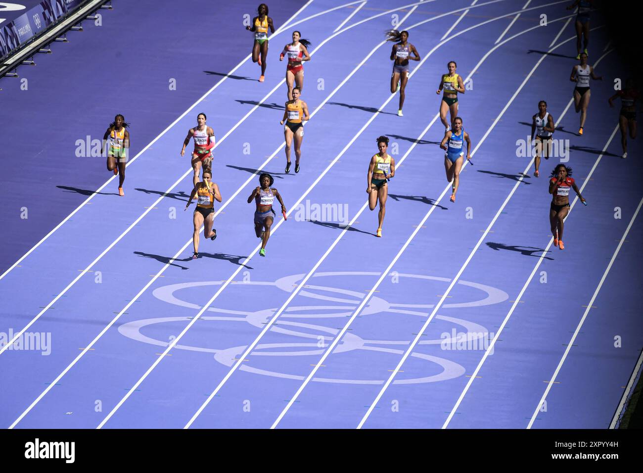Paris, France. 08th Aug, 2024. Athletes compete in the Women's 4x100m ...