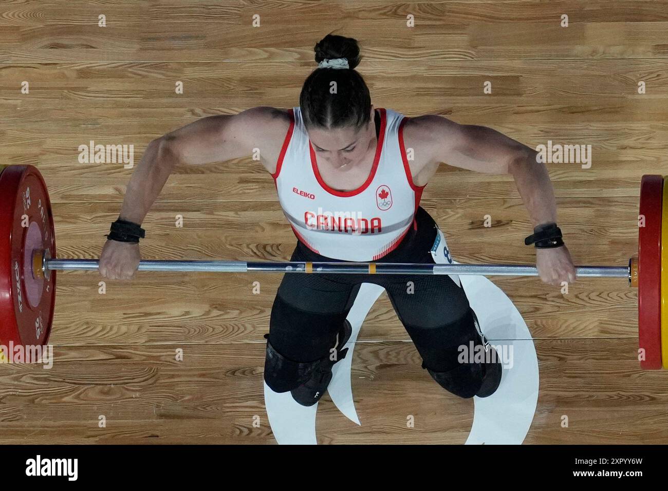 Maude Charron of Canada competes during the women's 59kg weightlifting ...