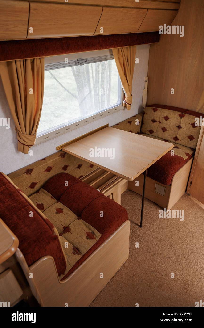 Cozy Caravan Interior with Kitchen and Sleeping Area. Ideal for ...