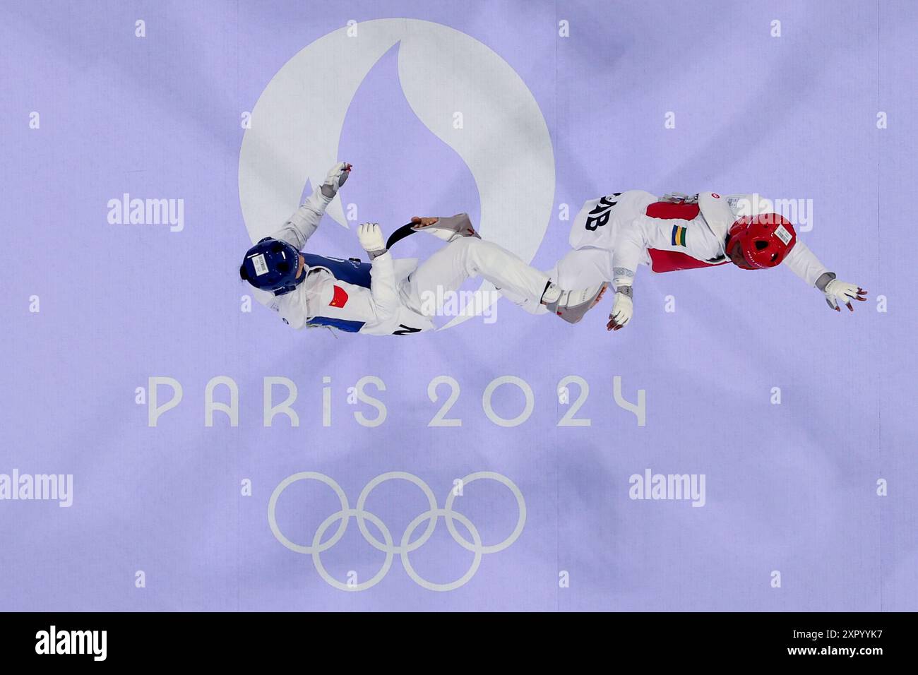 Paris, France. 8th Aug, 2024. Luo Zongshi (L) of China competes against ...