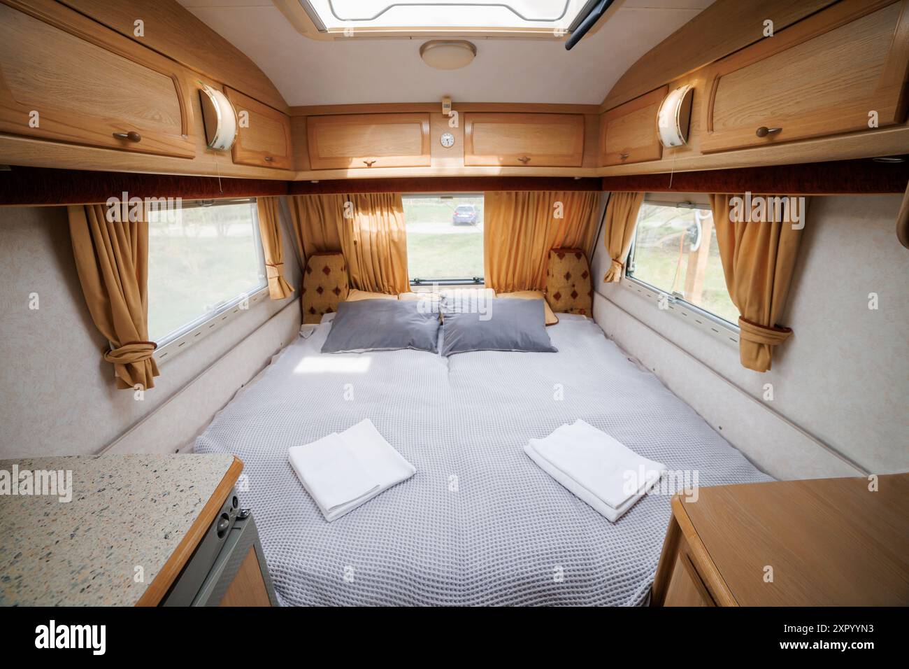 Cozy Caravan Interior with Kitchen and Sleeping Area. Ideal for ...
