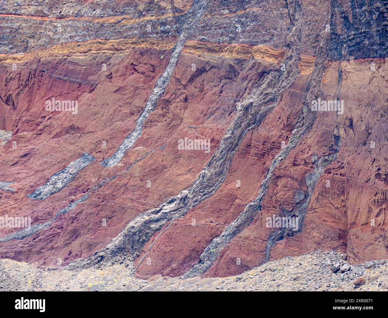 View of colourful volcanic cliff on Deserta Grande Island, Desertas ...