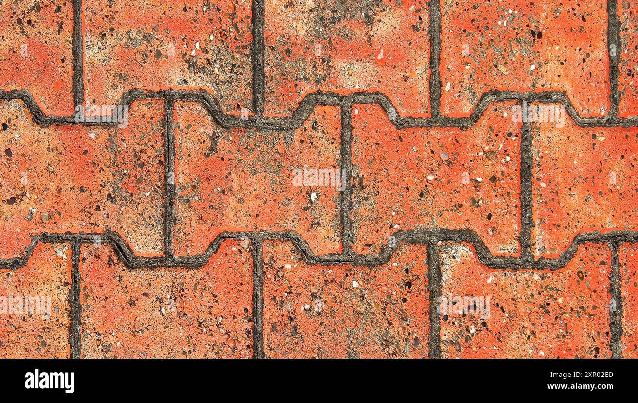 H-shaped concrete paving slabs, top view as background Stock Photo - Alamy