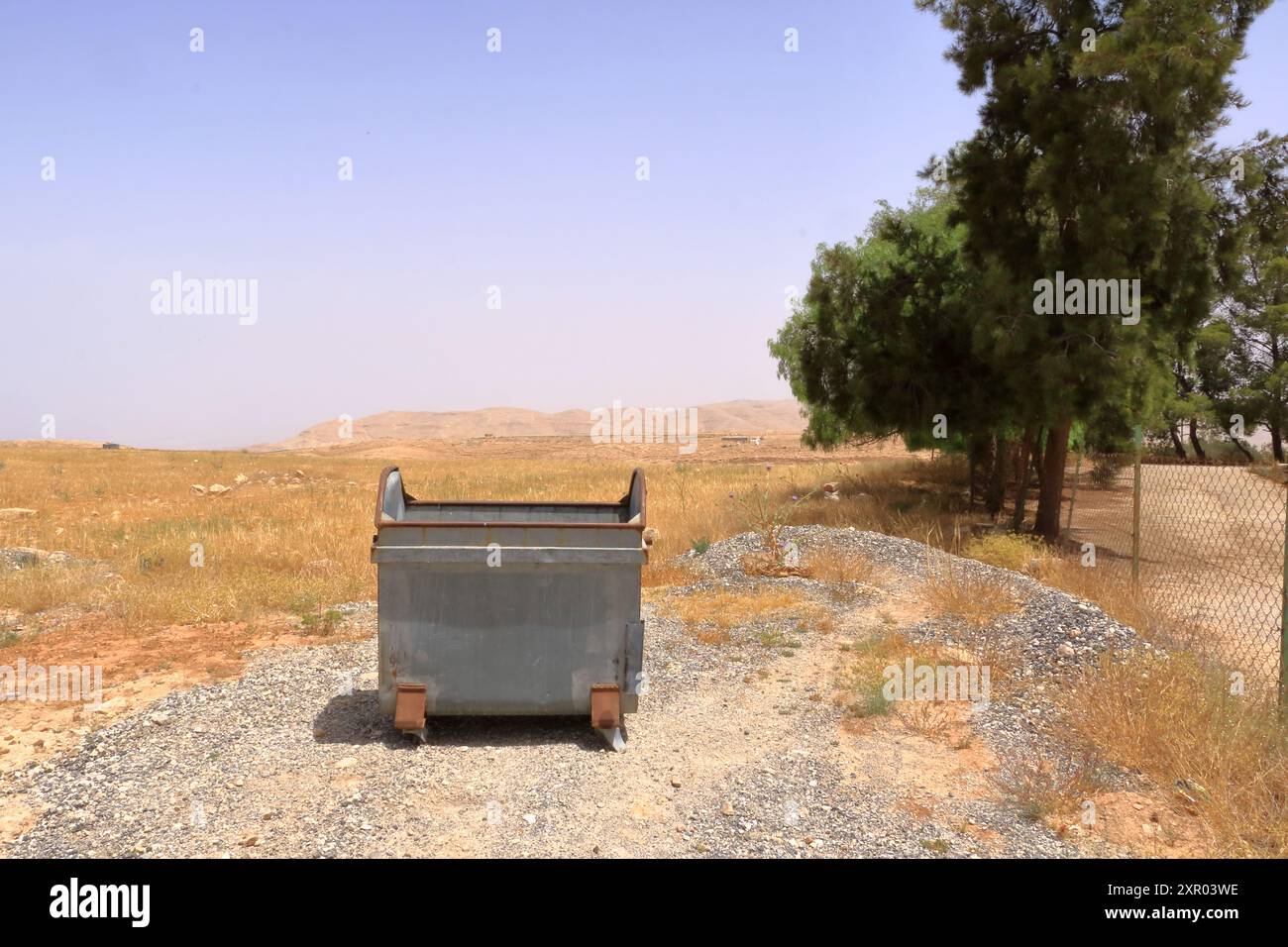 a big garbage container for trash in Jordan Stock Photo - Alamy