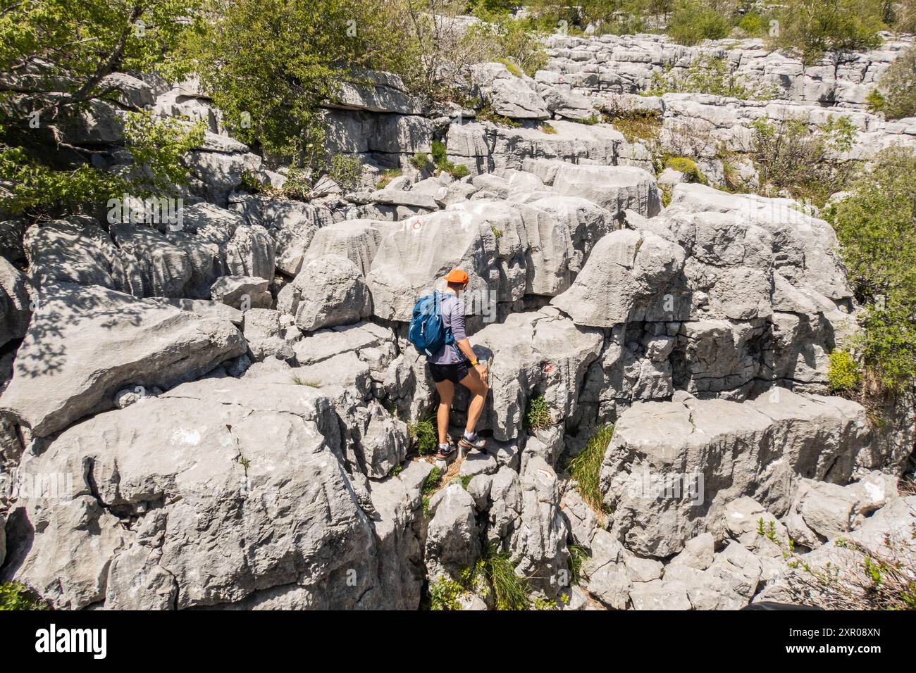 Climbing limestone fissures to Subra peak, Orjen Mountains, Herceg Novi ...