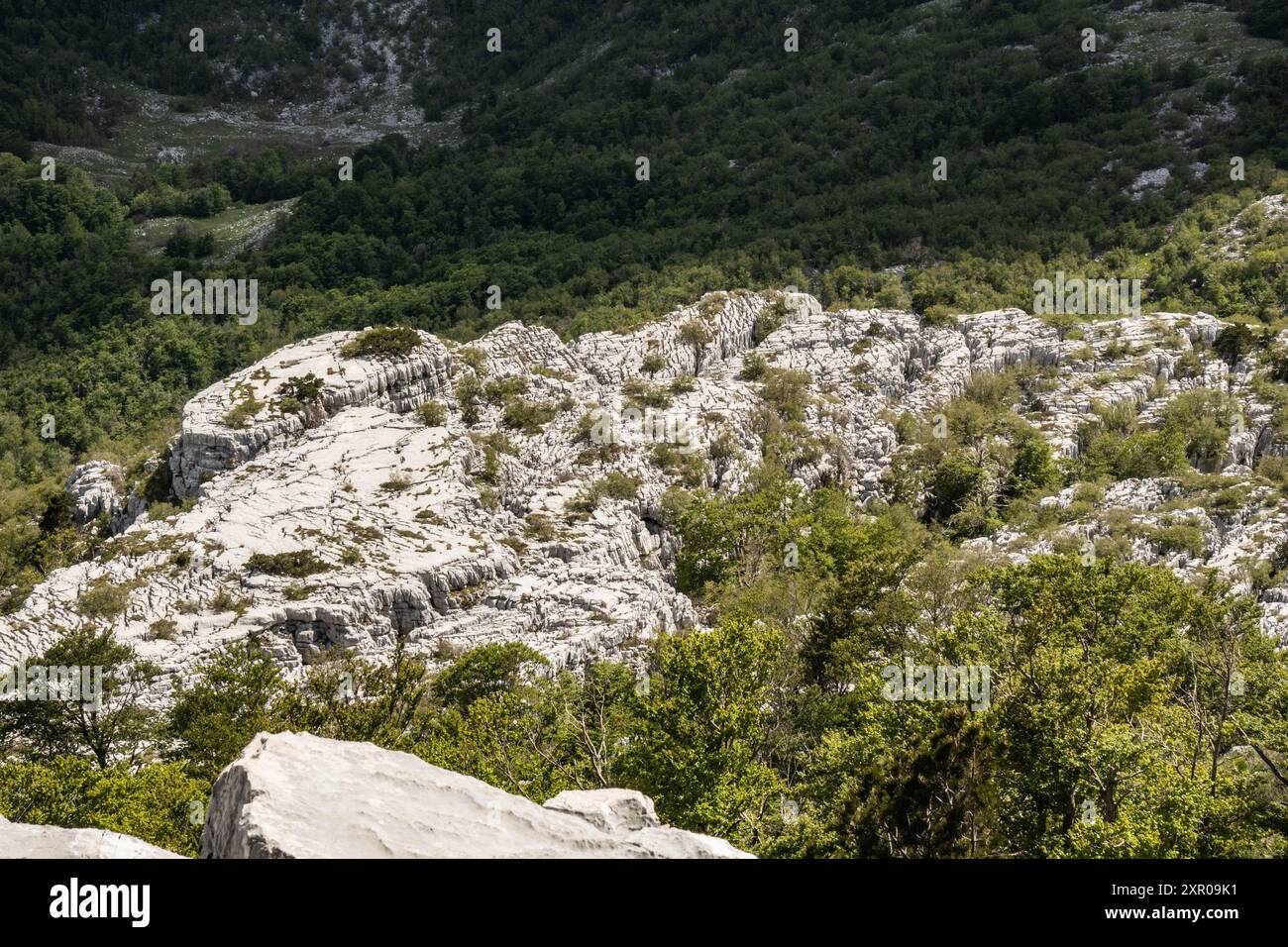 Climbing limestone fissures to Subra peak, Orjen Mountains, Herceg Novi ...