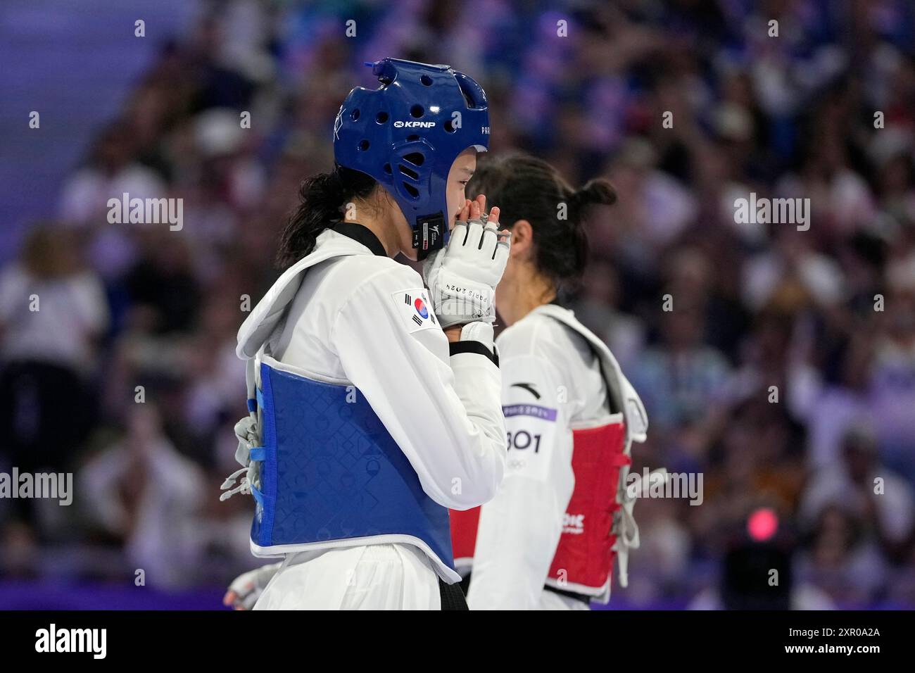 Korea's Kim Yujin reacts after winning in a women's 57kg Taekwondo ...