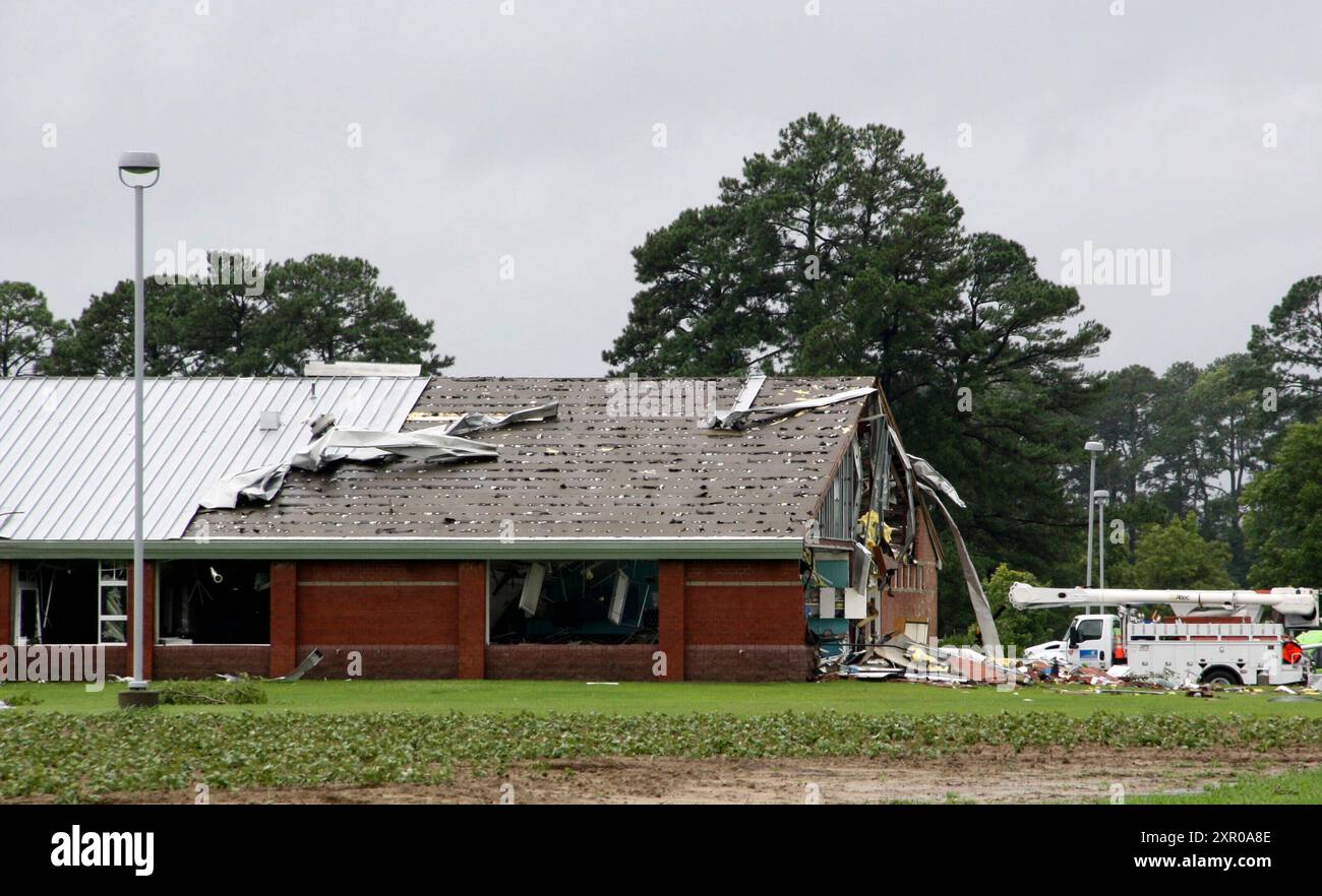 Parts of Springfield Middle School lay on the ground after being ripped ...