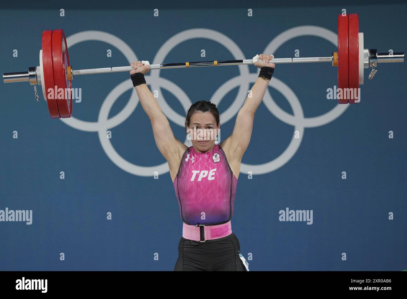 Kuo Hsing-Chun of Taiwan competes during the women's 59kg weightlifting ...
