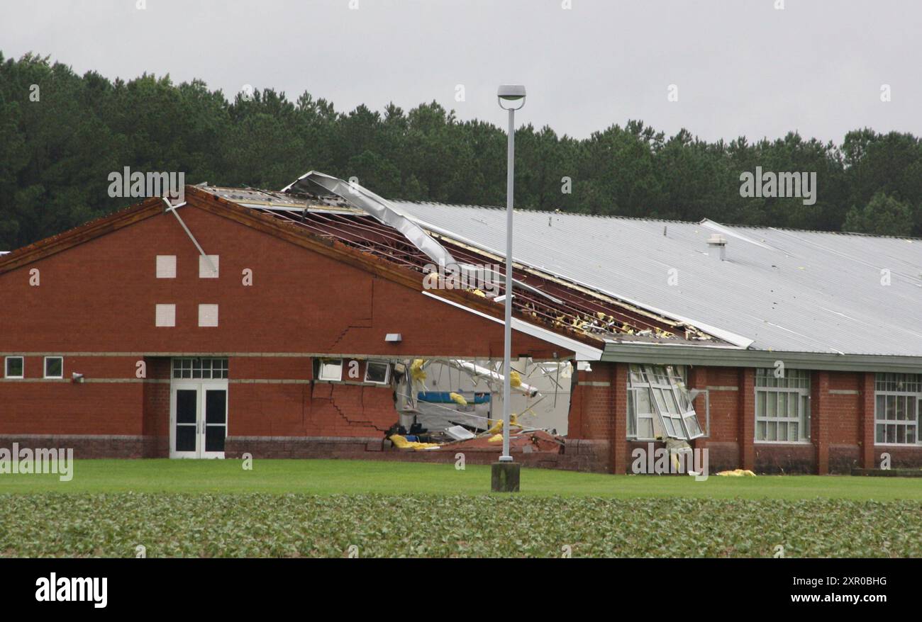 Parts of Springfield Middle School are damaged by a tornado, spawned by ...