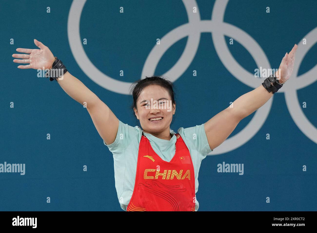 Luo Shifang of China celebrates as she finishes first to win the gold ...