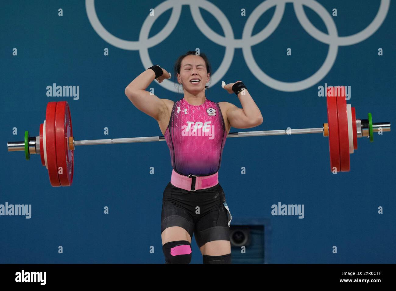Kuo Hsing-Chun of Taiwan competes during the women's 59kg weightlifting ...