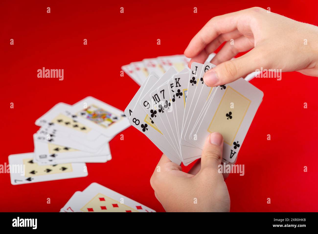Board game. Playing cards. poker cards in a young mans hand. Isolated ...